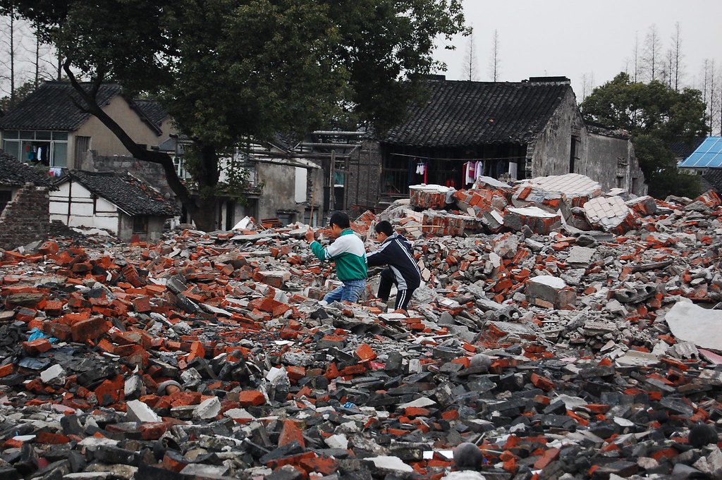 Escaping Poverty | As homes from old Shanghai are demolished… | Flickr