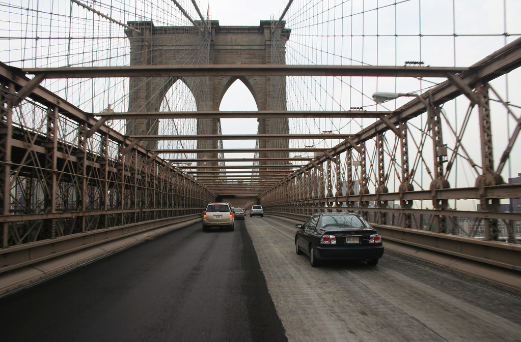 Brooklyn Bridge Driving Surface Cars On The Brooklyn Bridge In New
