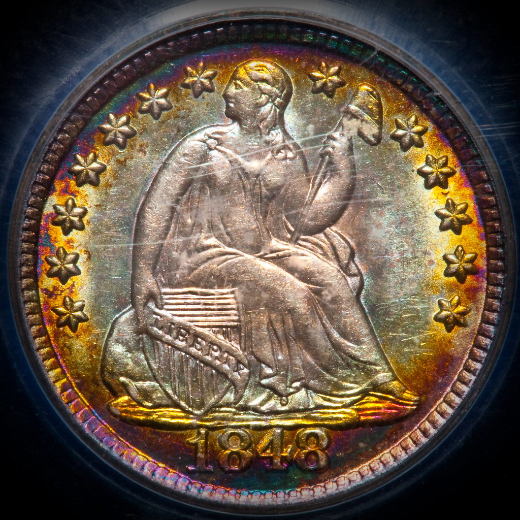 Day 118: 1848 Seated Liberty Half Dime with iridescent toning in a protective slab