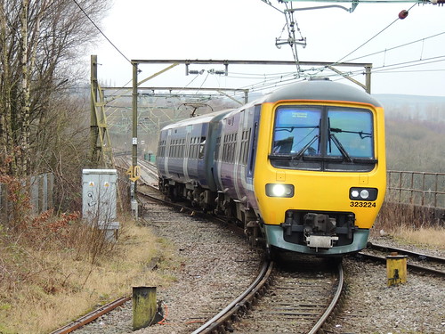 A Northern Rail Class 323 rolls off Dinting Viaduct, Dinti… | Flickr