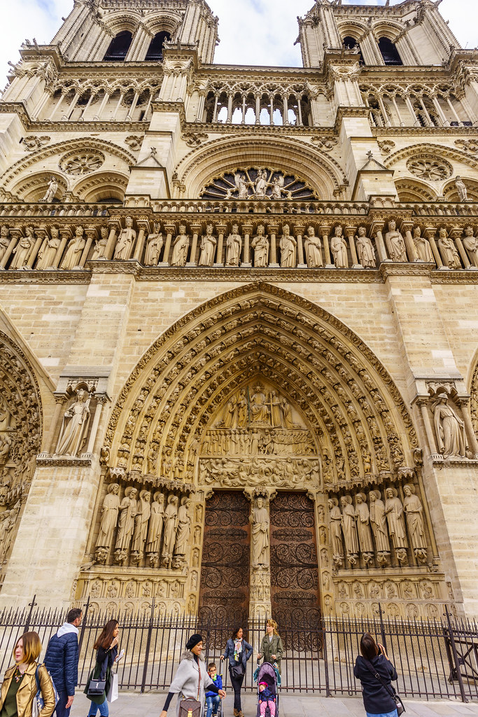 Portal of the Last Judgment on Notre-Dame's West Facade, Paris — Tourists in the Parvis for Scale