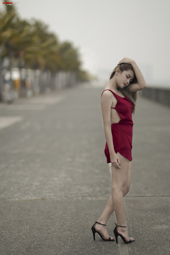 Crimson Dress Portrait on a Waterfront Promenade, Shallow Depth of Field with 85mm GM