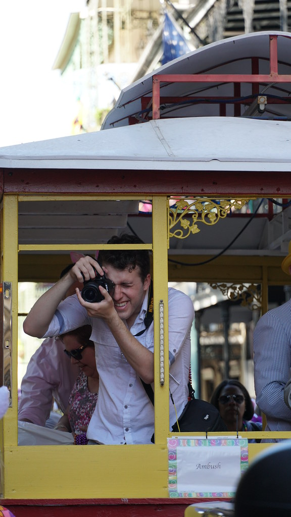 Parade Photographer in a Yellow Carriage Capturing New Orleans Easter Parades (French Quarter)