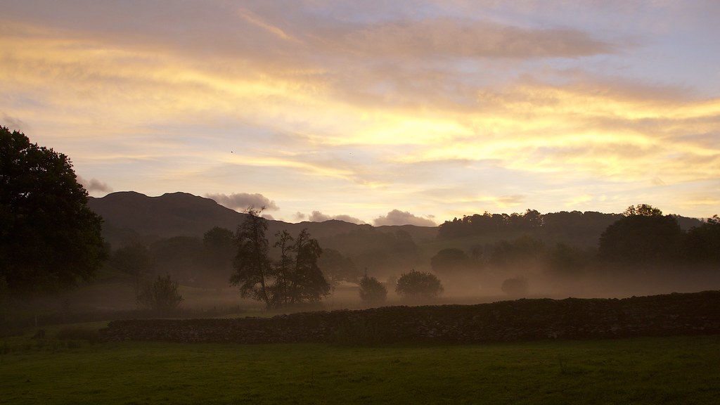 Autumn Daybreak over Elterwater in Langdale Valley, Cumbria, with dawn fog