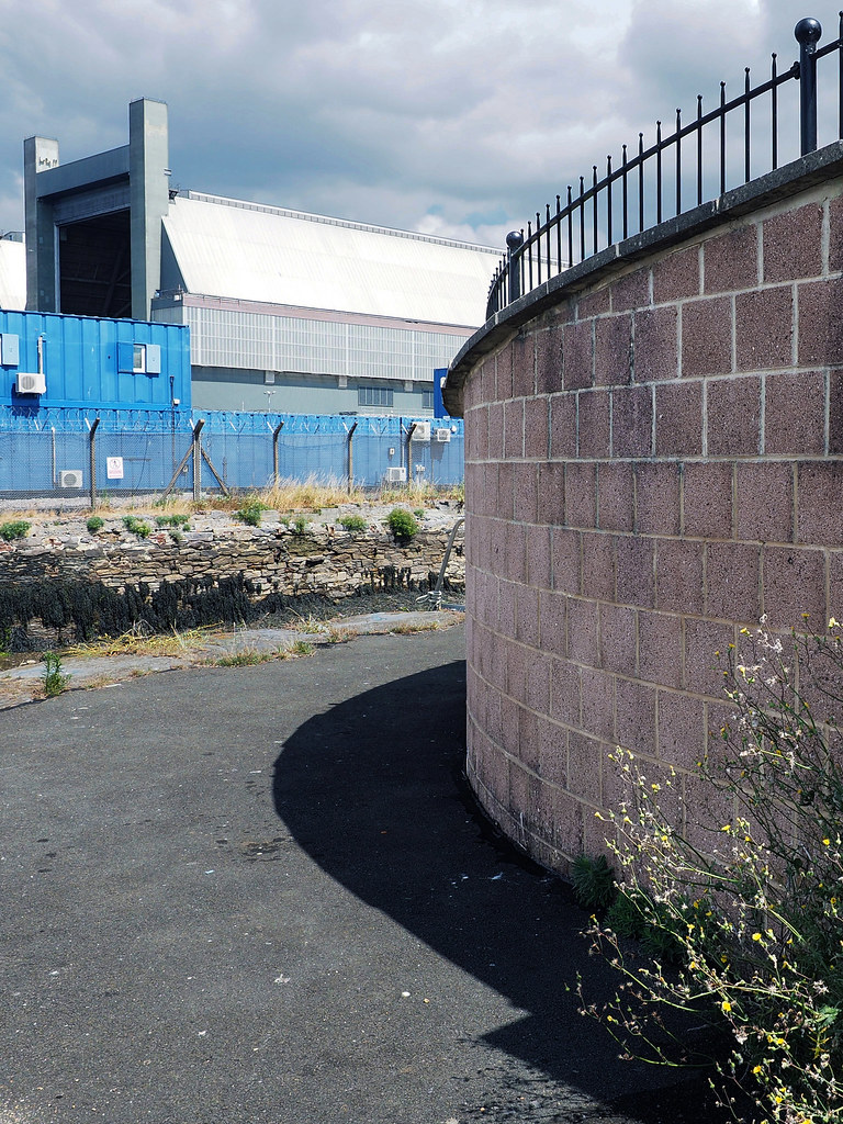 Curved Seawall at Devonport Harbour, Plymouth – Industrial Blues and Shadow