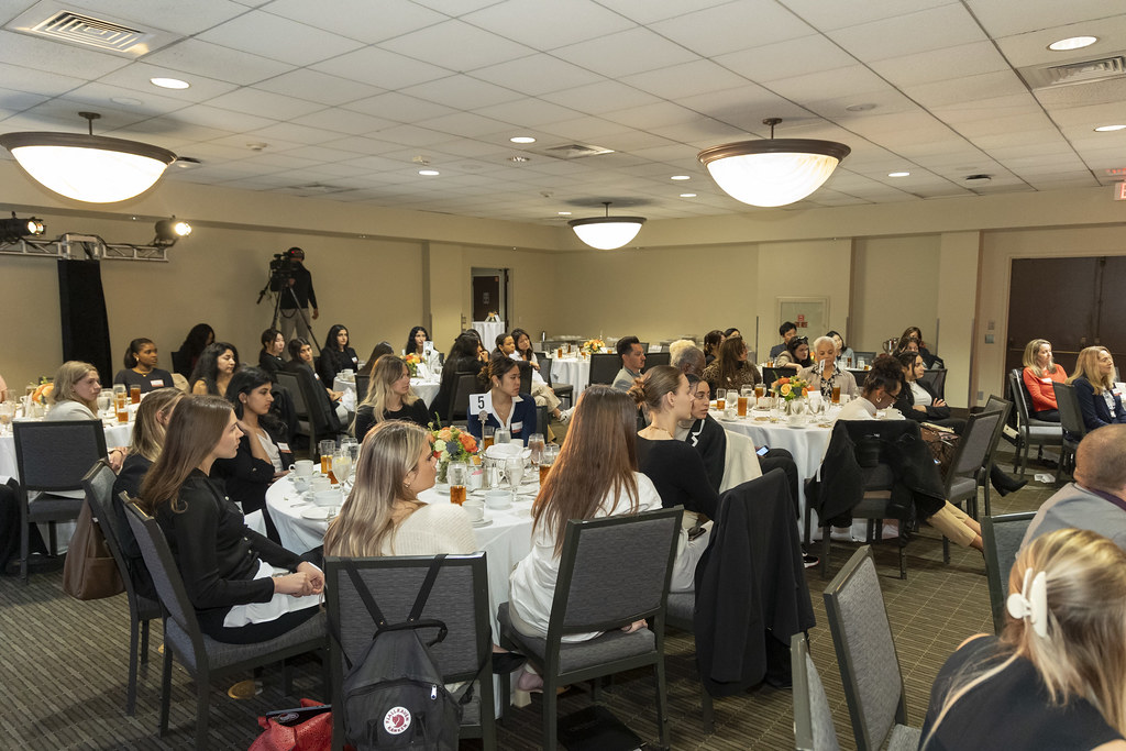 2025 Women in Real Estate Networking Dinner: Attendees Gather in a Banquet Hall