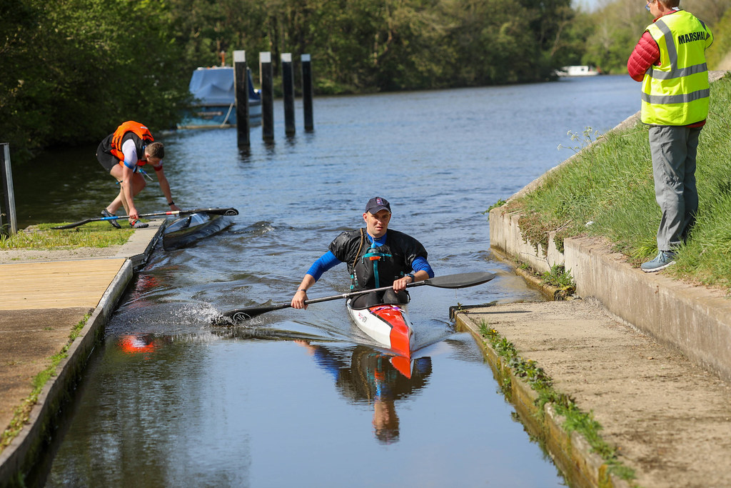 2025 Thrudarc Devizes Westminster: Kayaker in a red-and-white craft at Boveney, April 20, 2025