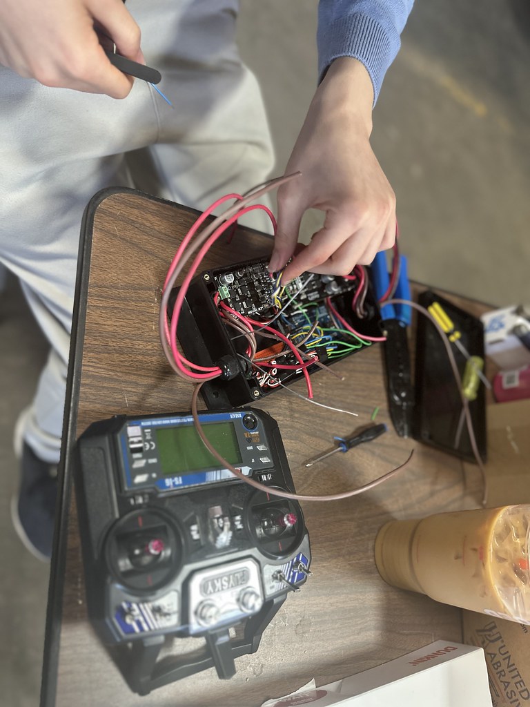 Engineering 411: Hands-on electronics assembly for a student-built skid-steer prototype