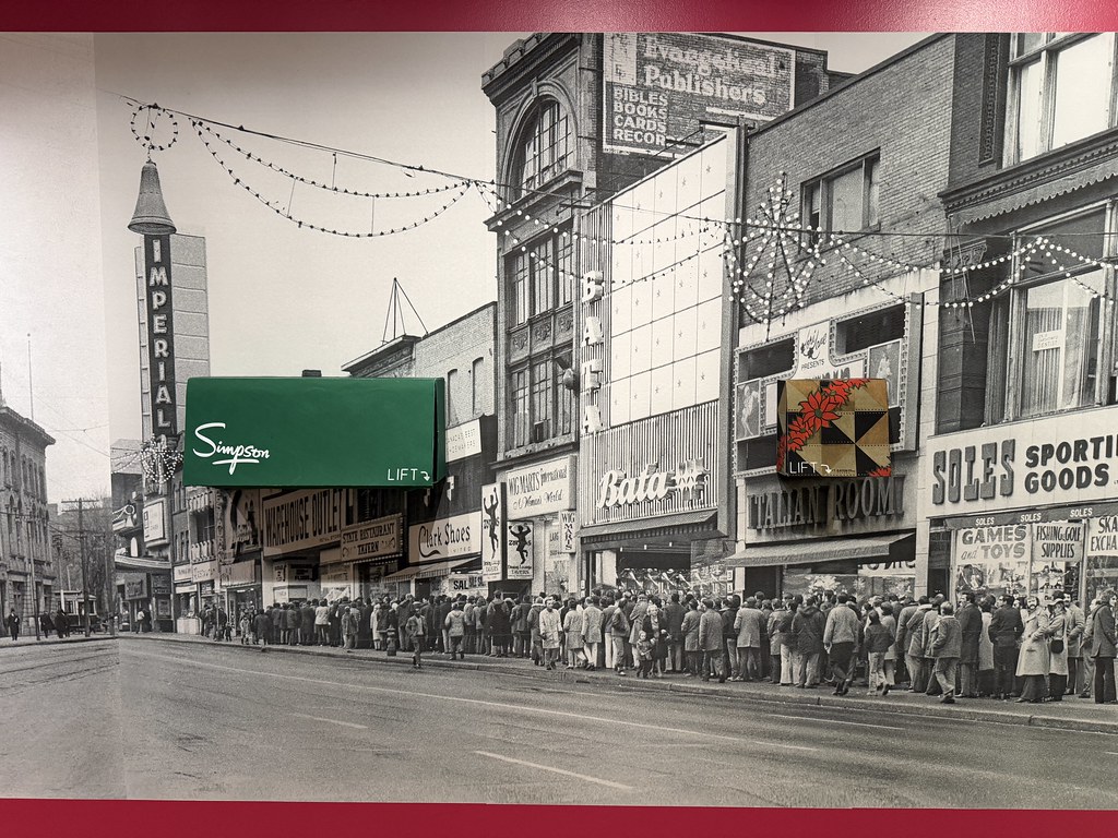 Crowds on a Historic Main Street: Retail Retrospective with Green Sign Overlay