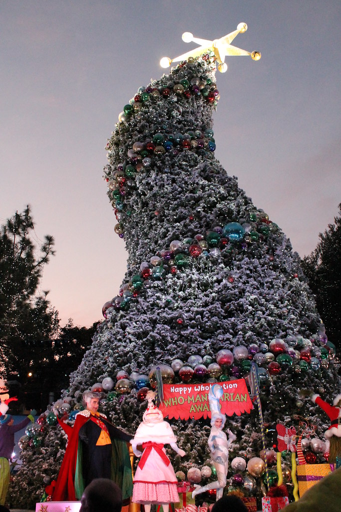 Wholiday Tree Lighting at Universal Studios Hollywood - Grinch's Winter Playground, Upper Lot: Snow-Covered Christmas Tree Adorned with Multicolored Ornaments