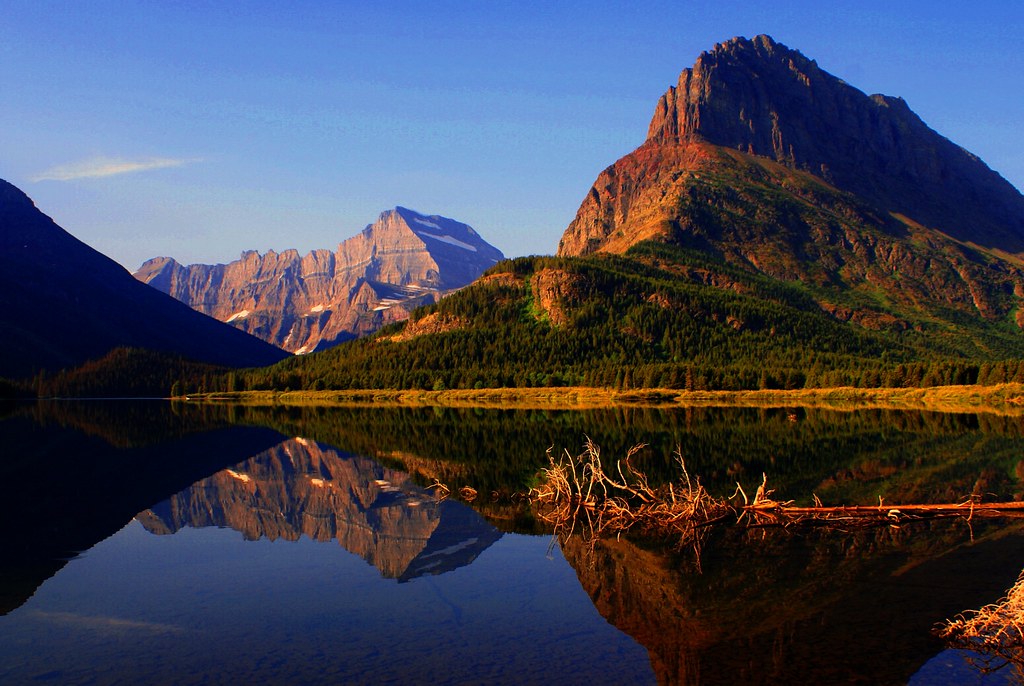Glacier National Park | Mt Gould and Grinnell reflection in … | Flickr