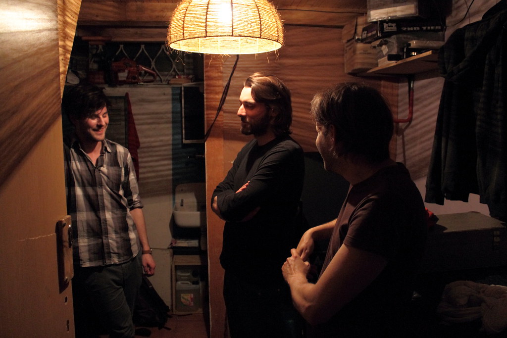 Backstage pre-show gathering in a warm dressing room at Kulturní centrum KLUBOVNA, Praha 6 – Dejvice