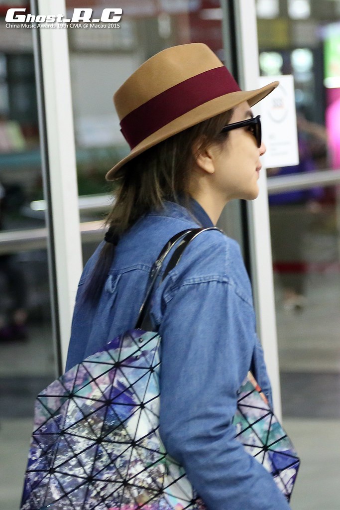China Music Awards 19th CMA Macau 2015 – Unidentified attendee in denim shirt, tan fedora, and geometric mosaic tote