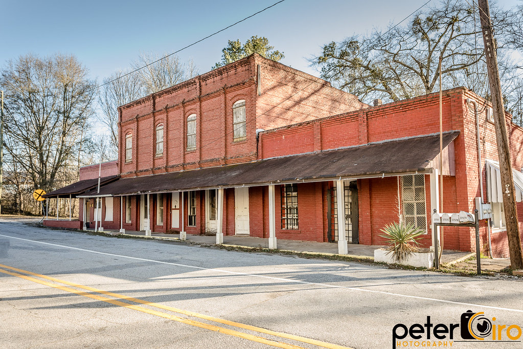 Historic Red Brick Storefront of an Abandoned Building in Downtown Rex, Georgia